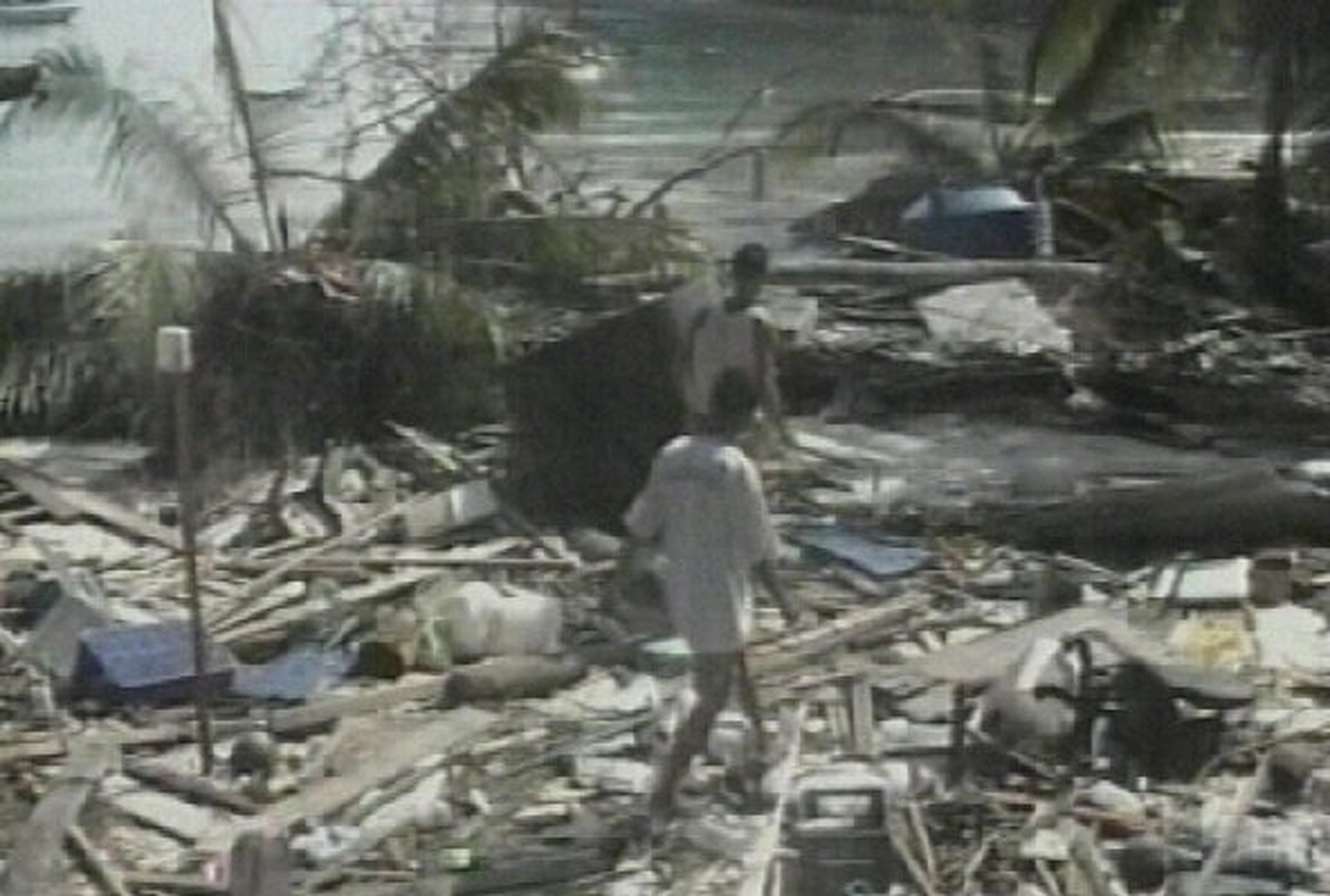 Disaster death toll now nearly 77,000