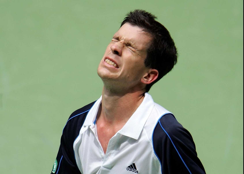 Henman out in straight sets