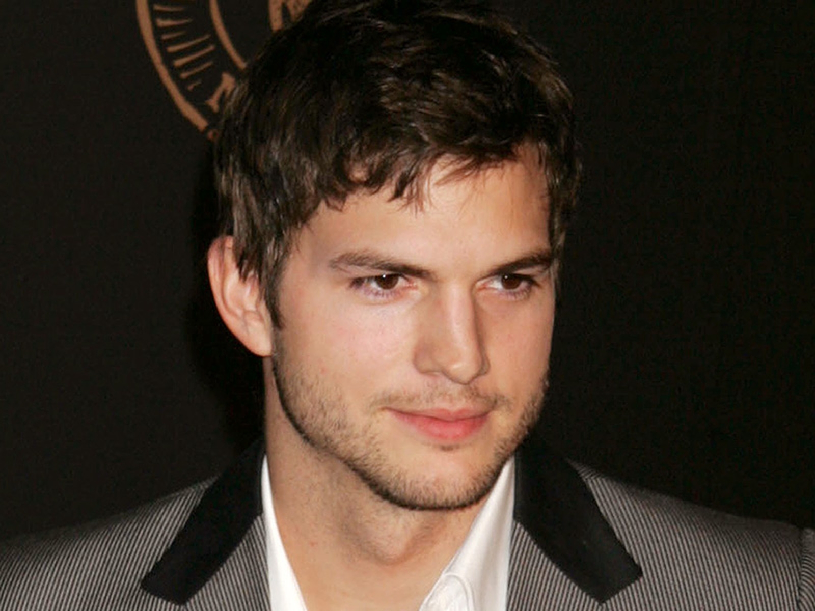 Kutcher gets cast as former hitman