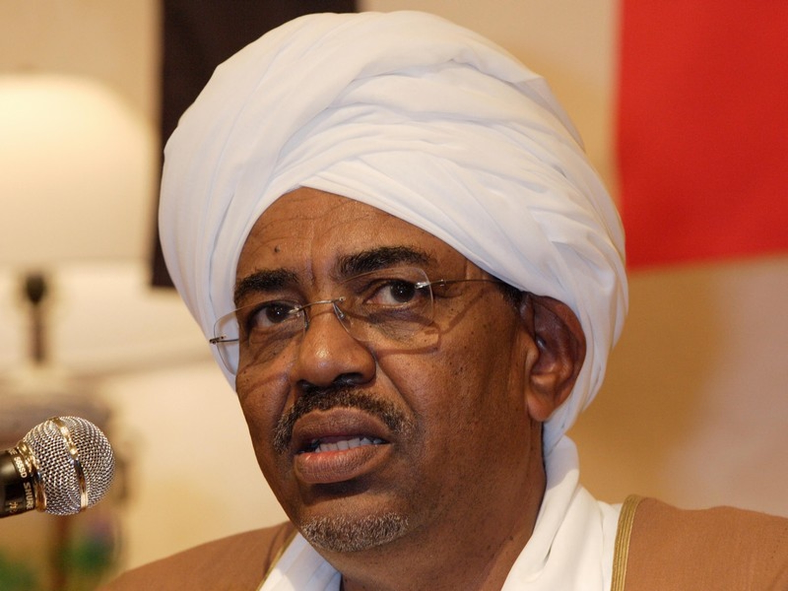 Bashir threatens more expulsions