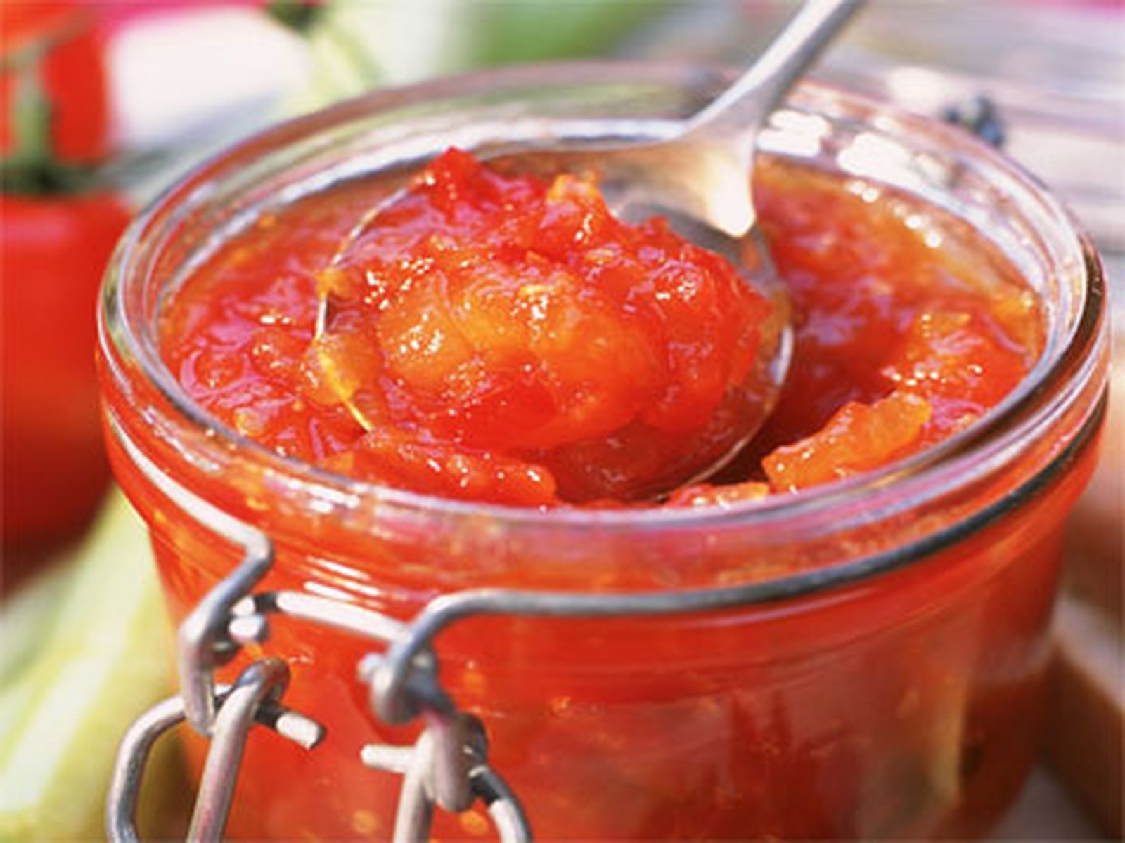 Red pepper, tomato and chilli chutney with plump raisins and fresh herbs