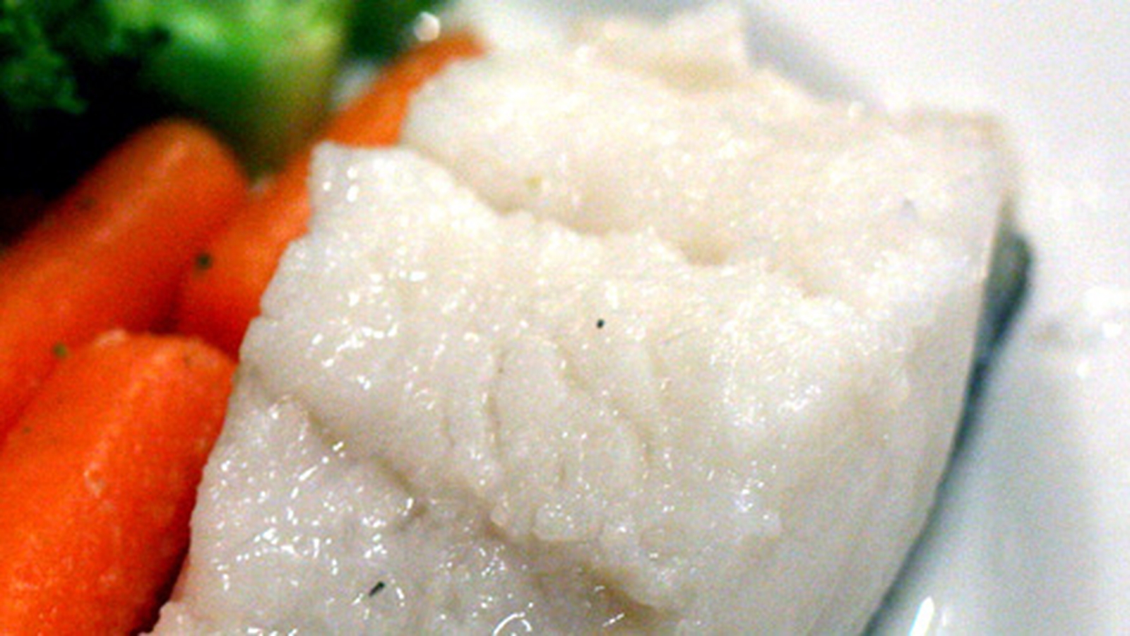 Steamed White Fish with Mushroom Sauce and Carrots