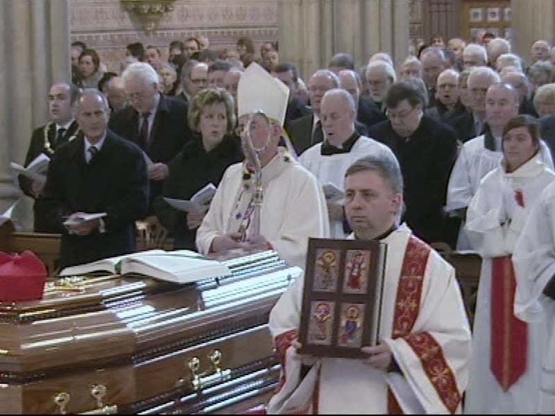 Mourners attend Cardinal Daly's funeral