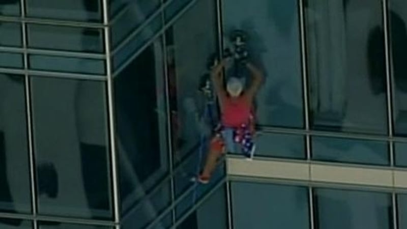 Man climbs San Francisco skyscraper
