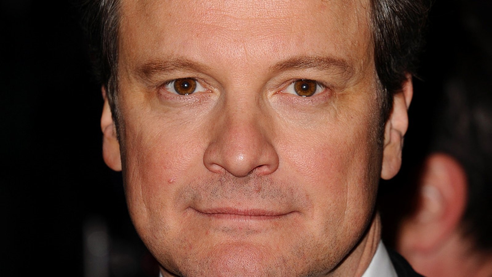 Firth says marriage is like "a marathon"