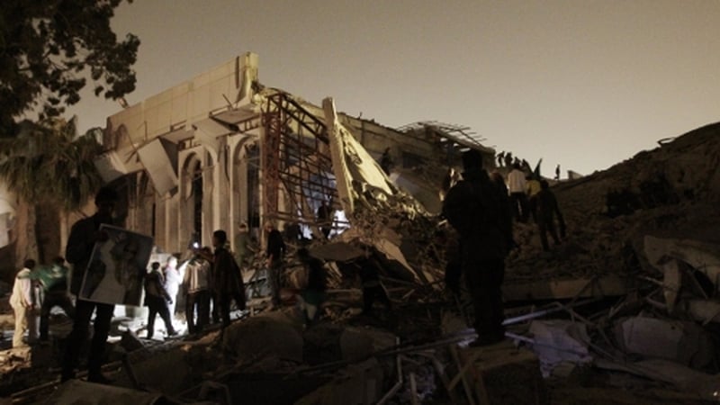 Gaddafi unhurt in compound strike