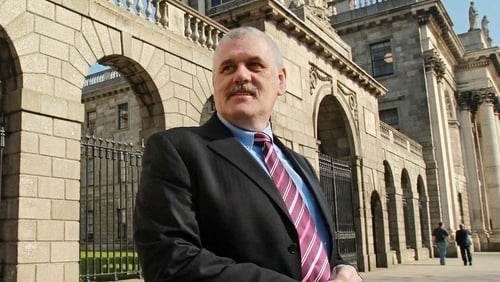 Three on trial over threats to publican