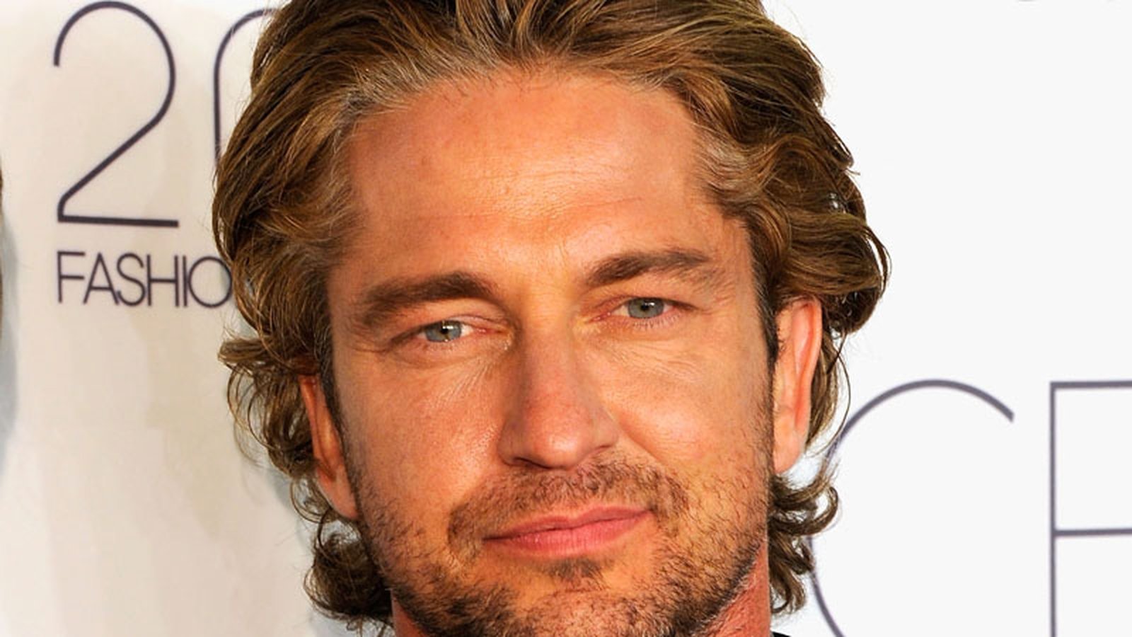 Butler recalls reuniting with estranged father