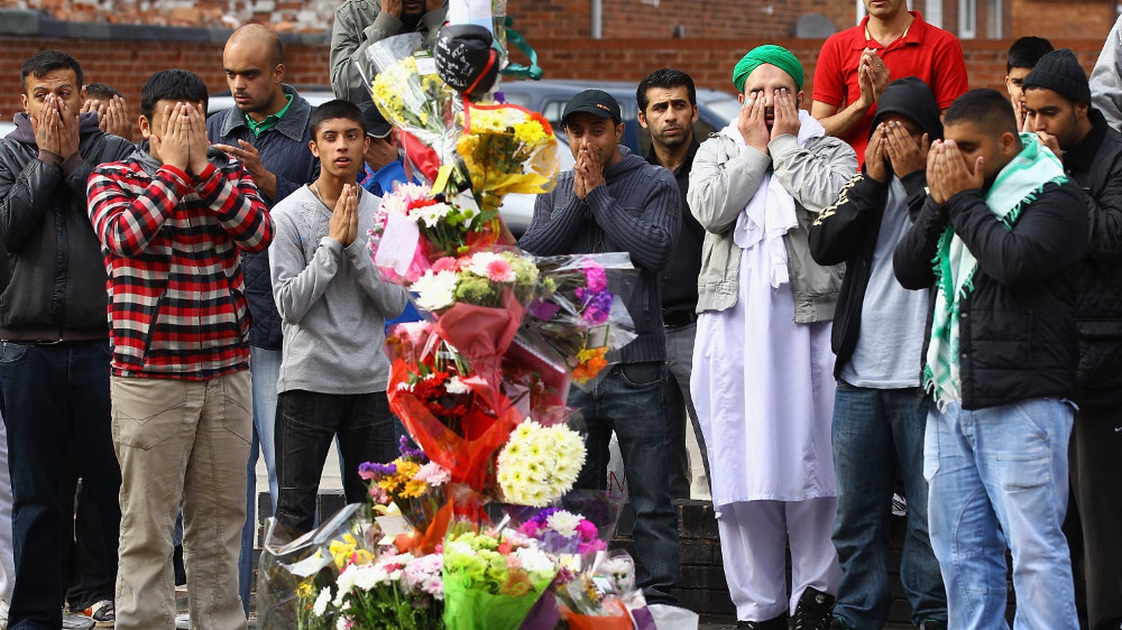 Thousands mourn Birmingham riot victims