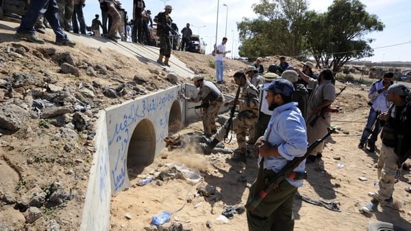 Muammar Gaddafi buried in secret location