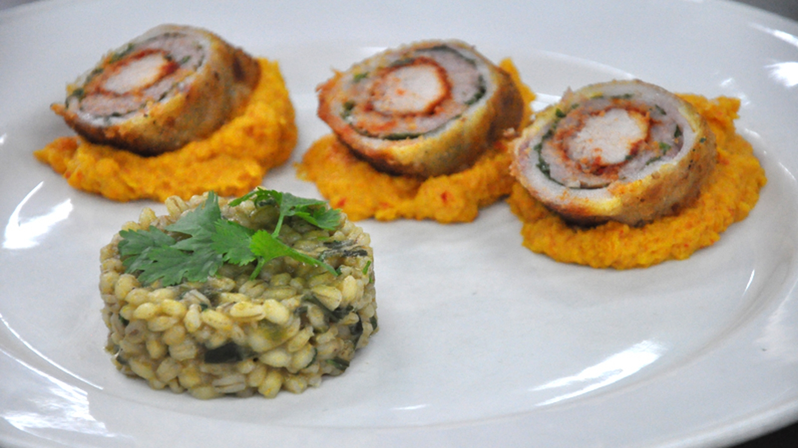 Roulade of Rabbit with barley risotto and coriande