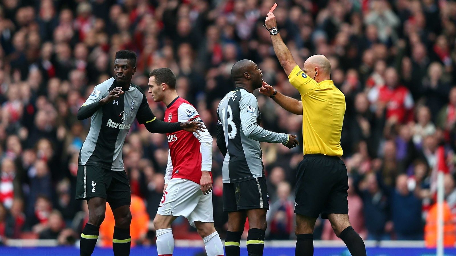 Arsenal fire five past woeful Spurs