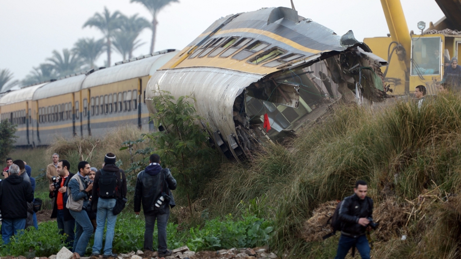 Military train crashes in Egypt killing 19