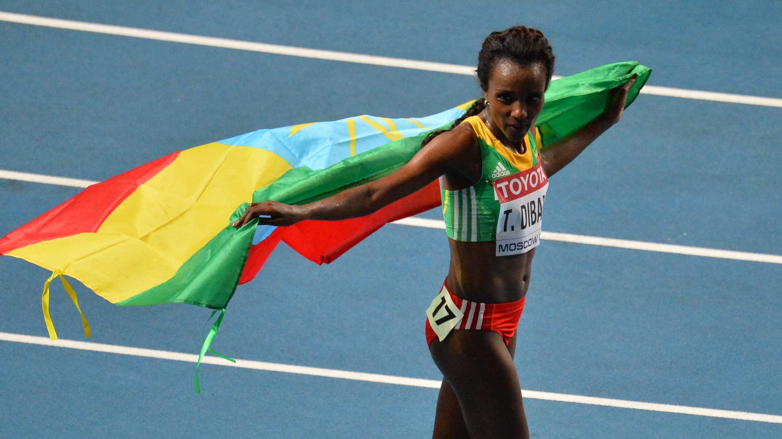 Dibaba completes world 10,000m hat-trick