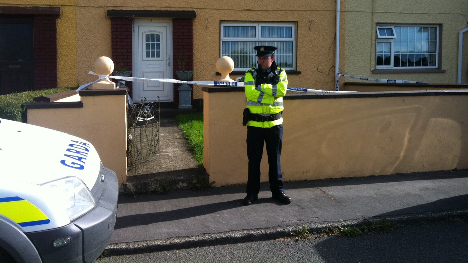 Suspect in woman's death under armed guard