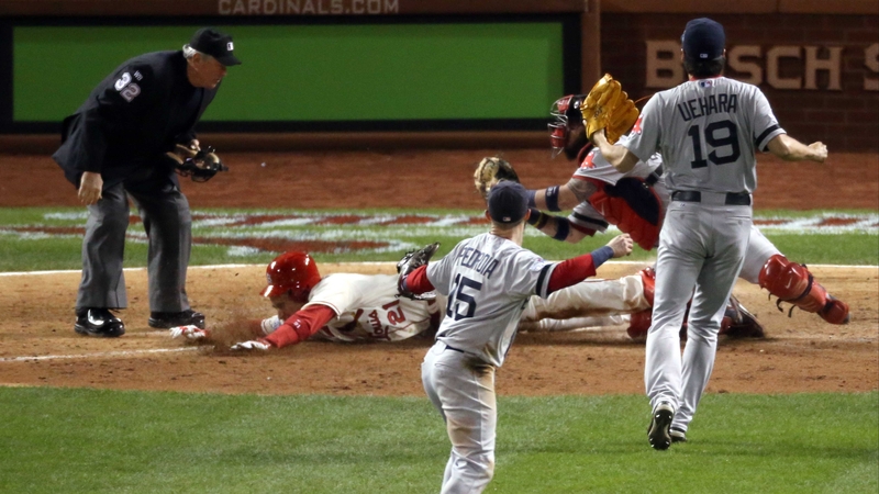 Cardinals win on interference call