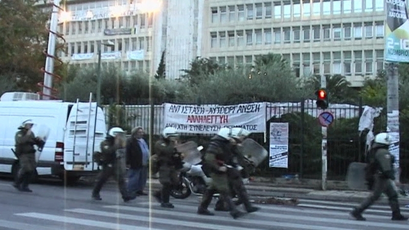Greek riot police storm former state TV building