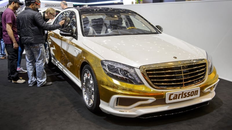 World's first gold-covered car on display in Geneva