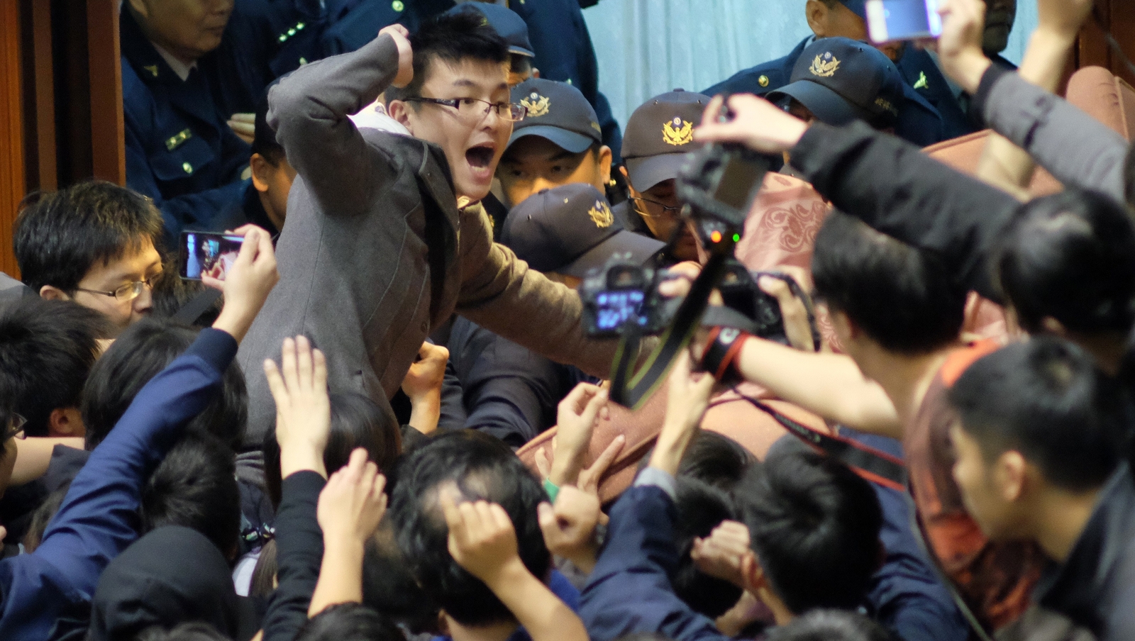 Taiwan protesters occupy parliament over pact