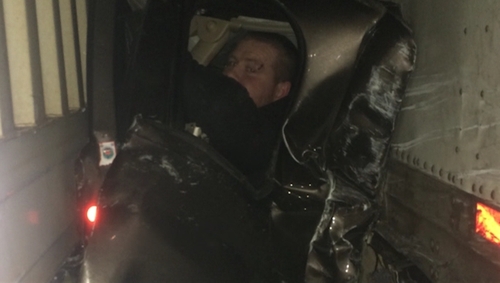 Man survives pile-up that crushed his truck