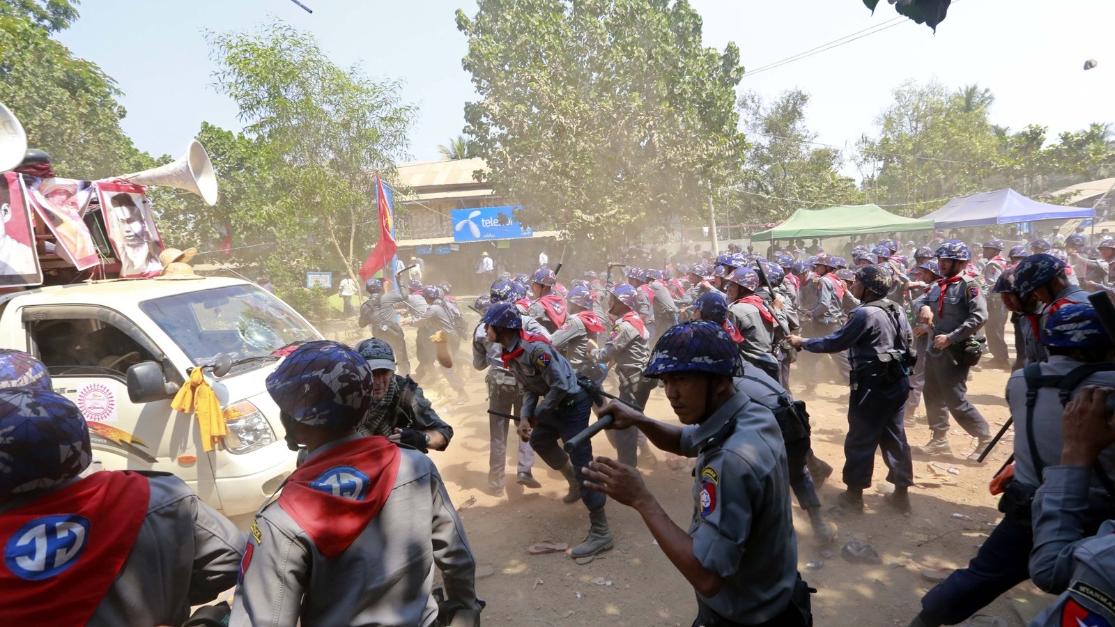 Up to 100 detained after Burma protest crackdown