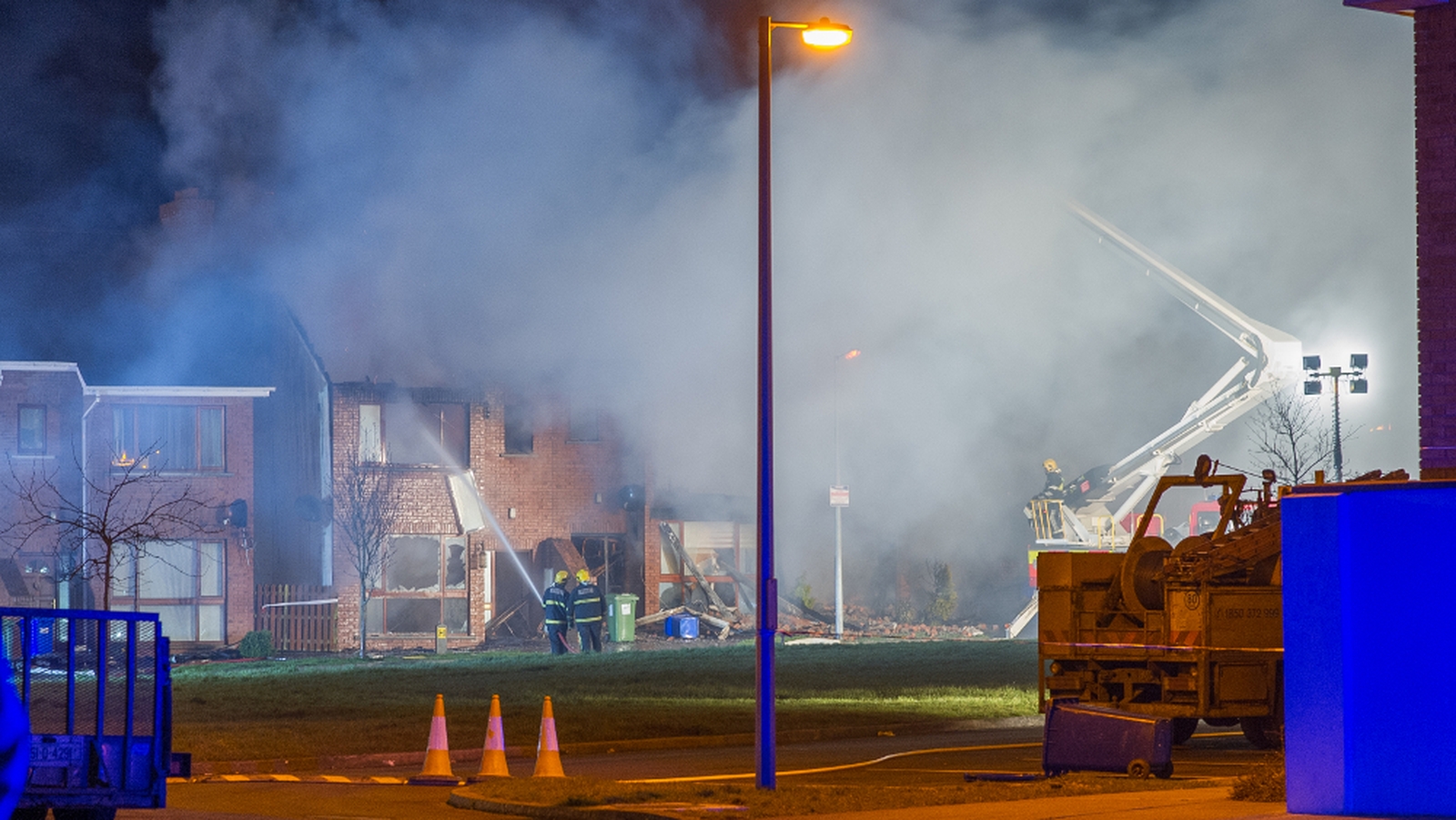 Man held after houses damaged in Newbridge fire