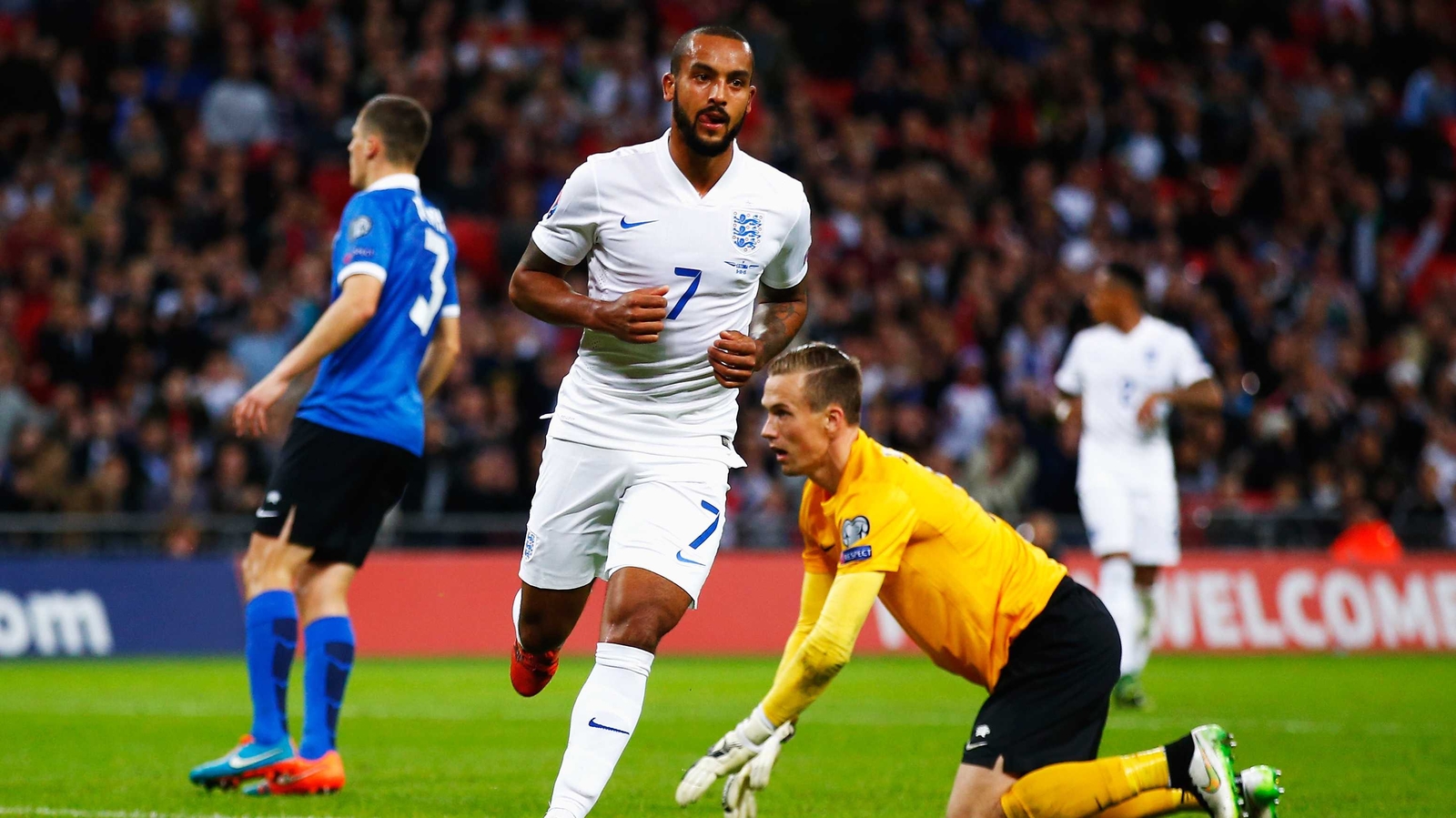 Walcott on mark as England seal flawless campaign