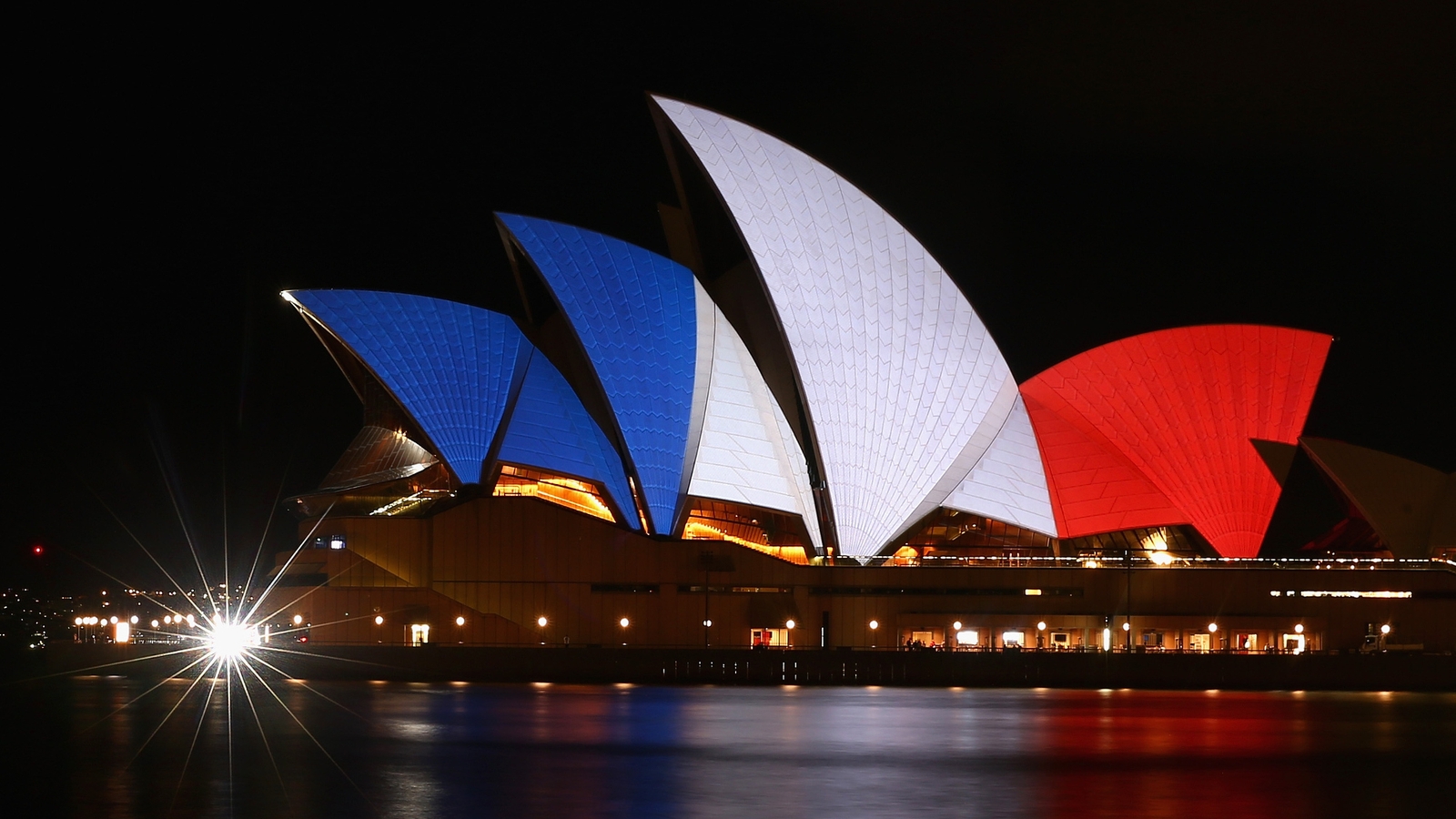 World lights up in solidarity with France