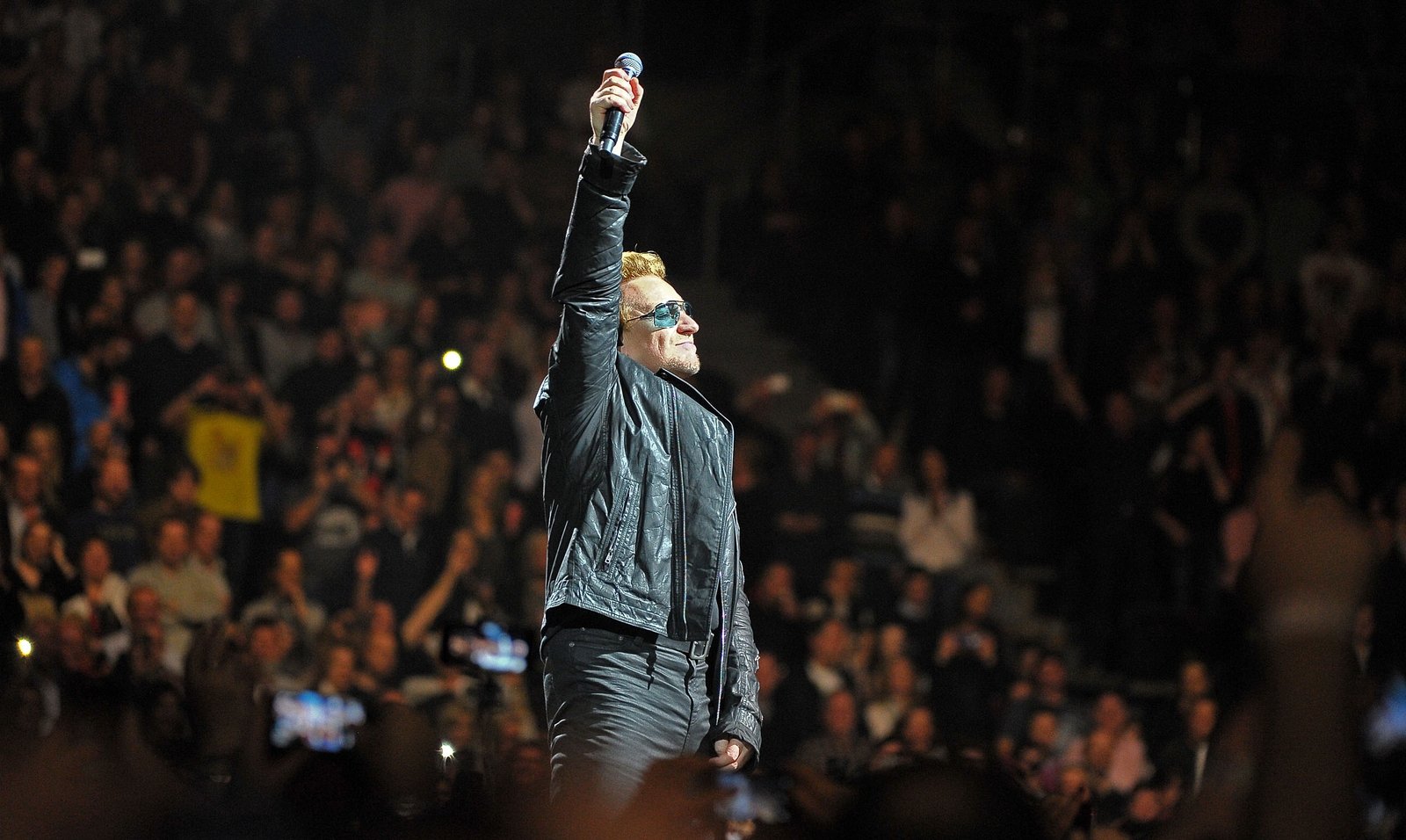 Bono arrives on stage in Belfast