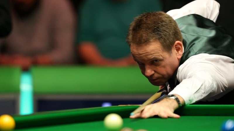 Joe Swail out as John Higgins survives scare