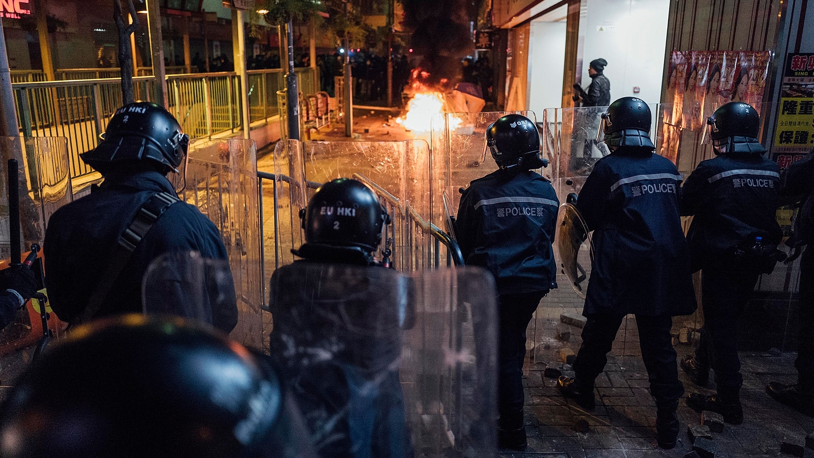 Hong Kong riot police fire shots in street clashes
