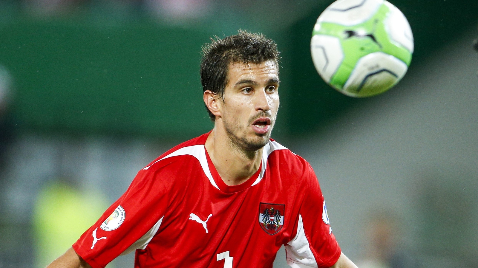 Austria's Garics to play on despite father's death