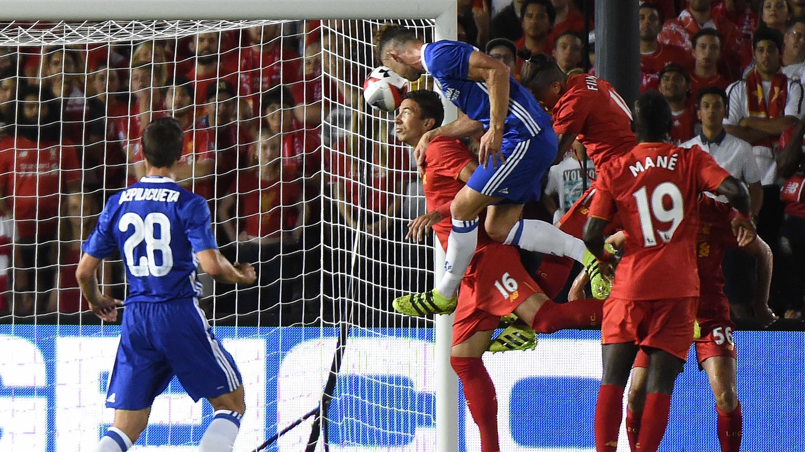 Fabregas sees red as Chelsea beat Liverpool in LA