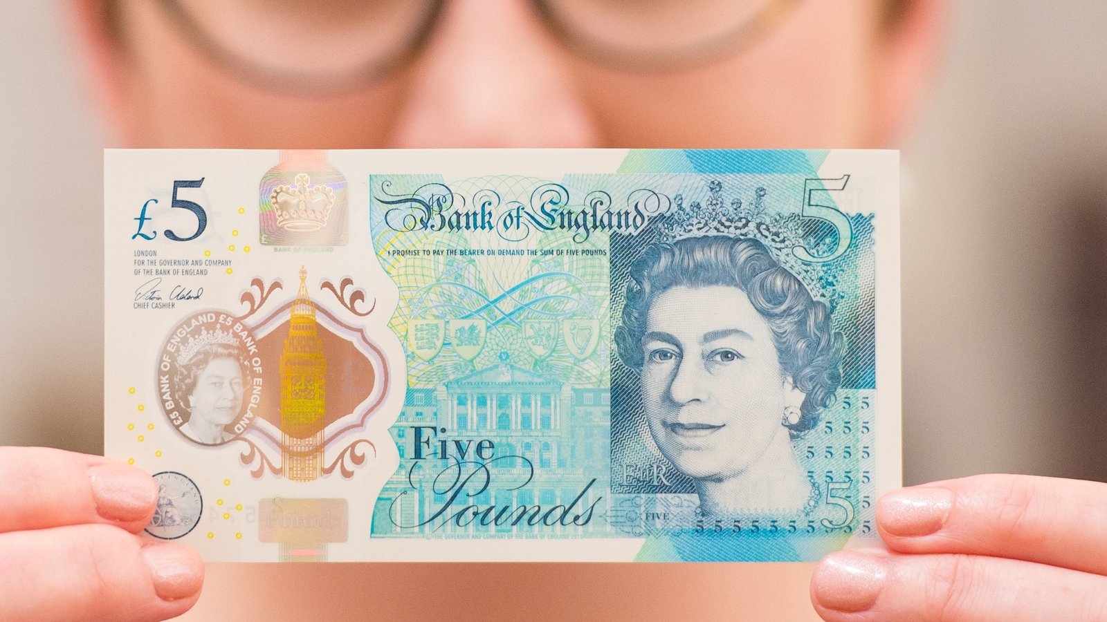 Britain launches new polymer £5 note