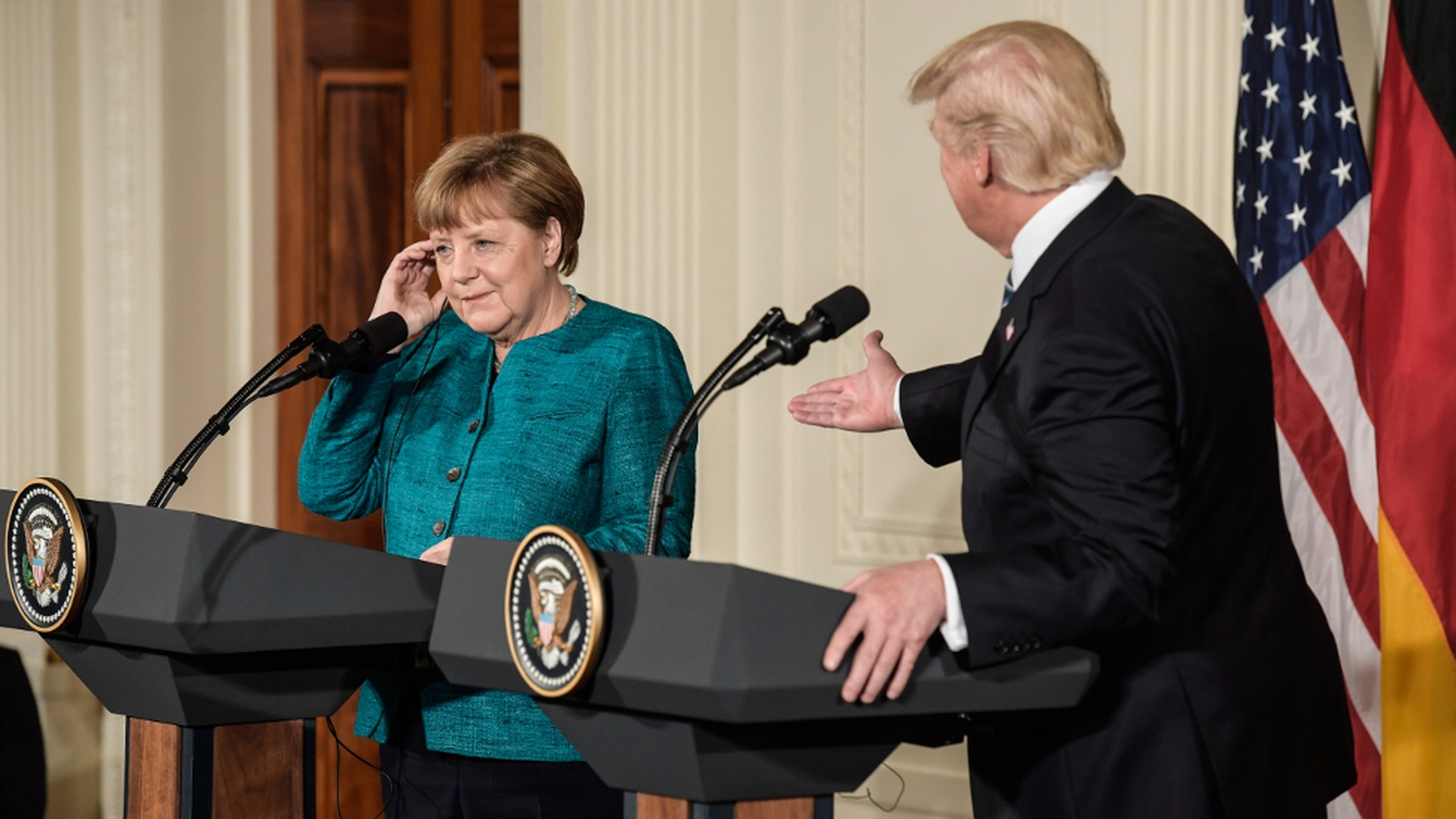 Awkward body language, quip in Trump-Merkel meeting