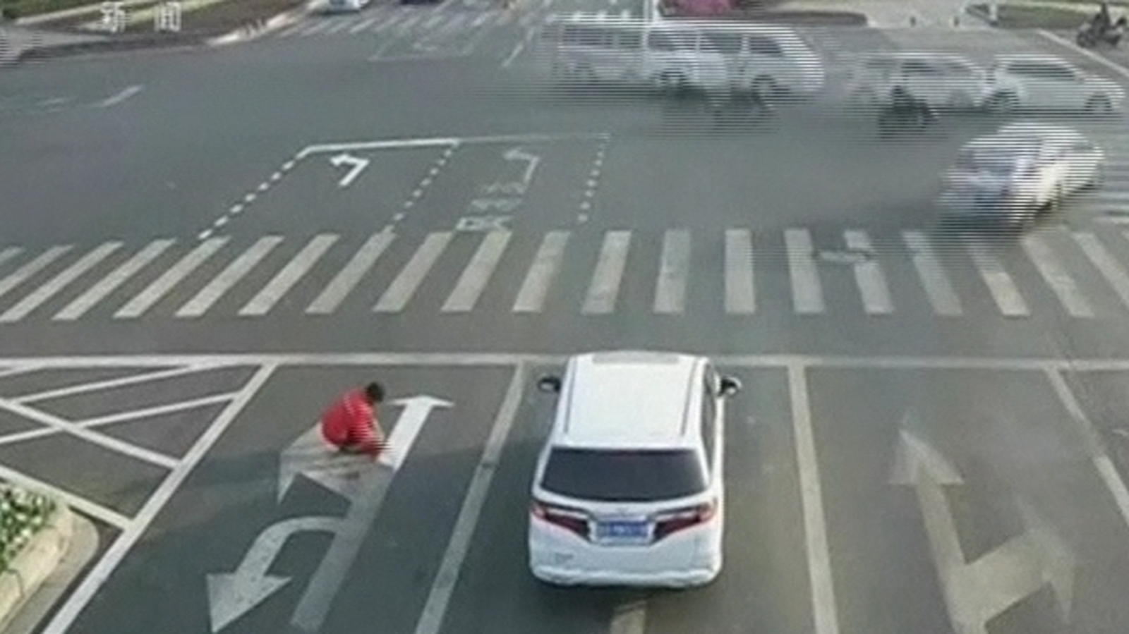 Out of line: Chinese man repaints road to ease commute