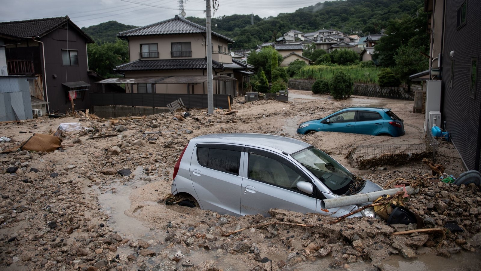 Search for survivors after 122 die in Japan floods