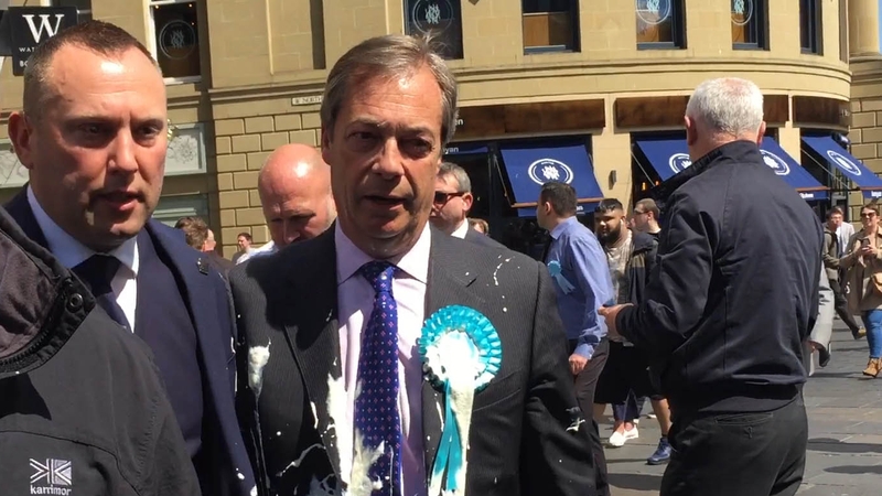 Man charged after Nigel Farage hit by milkshake