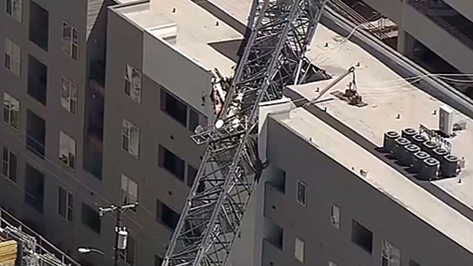 Woman killed after crane collapses on Dallas building