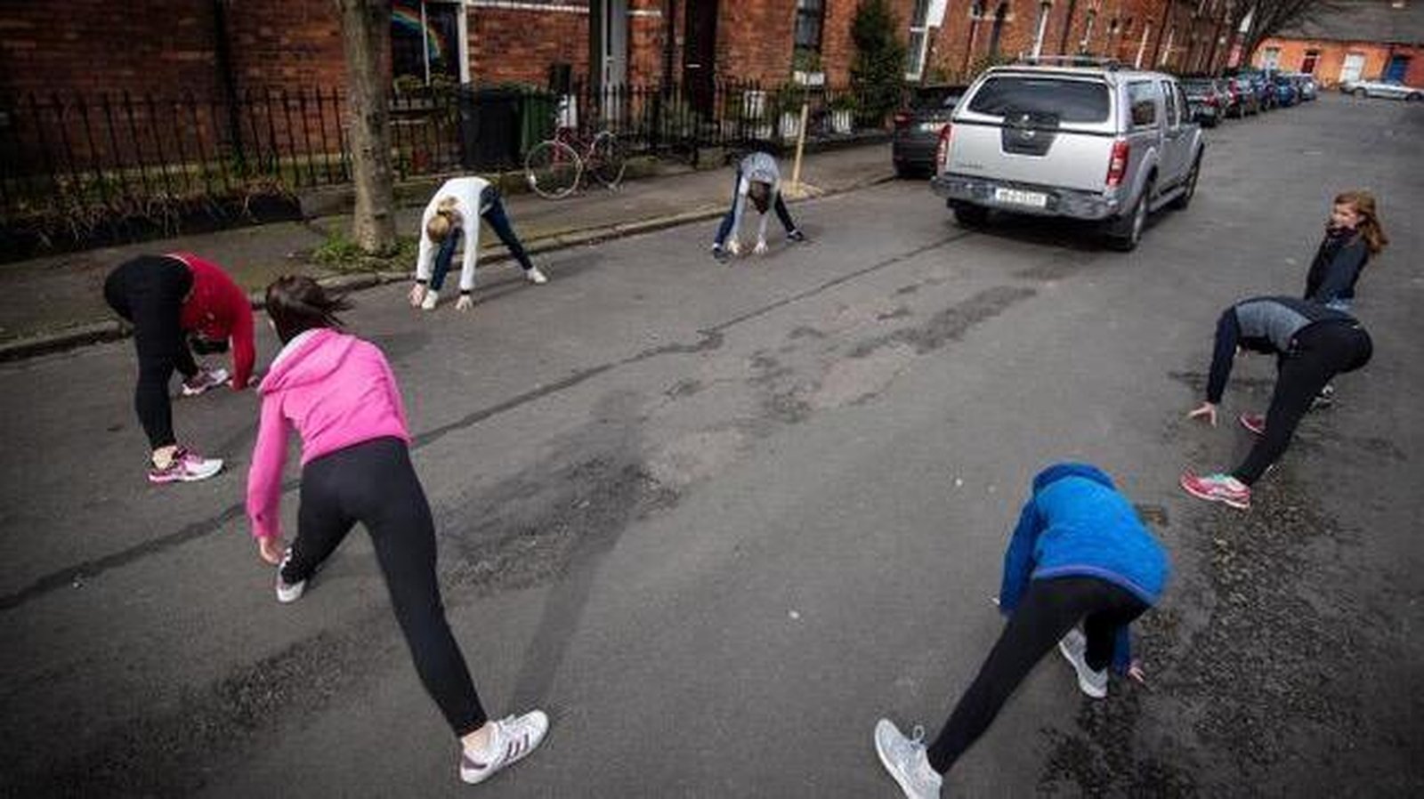 Residents take to street for social distancing workouts