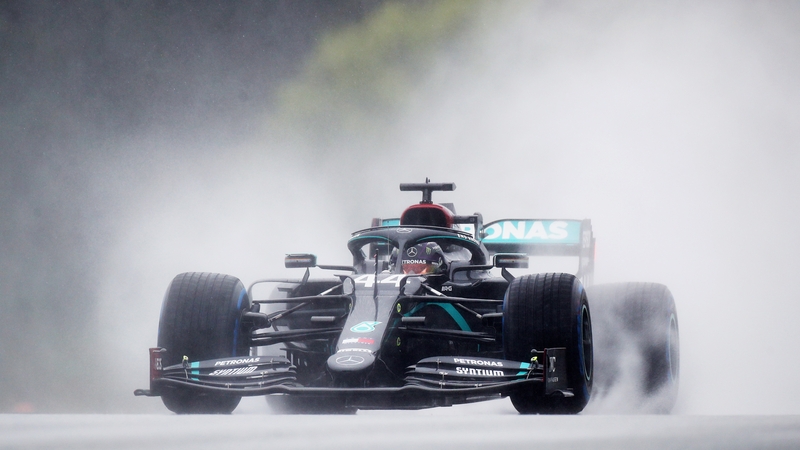 Hamilton handles rain to take pole in Austria