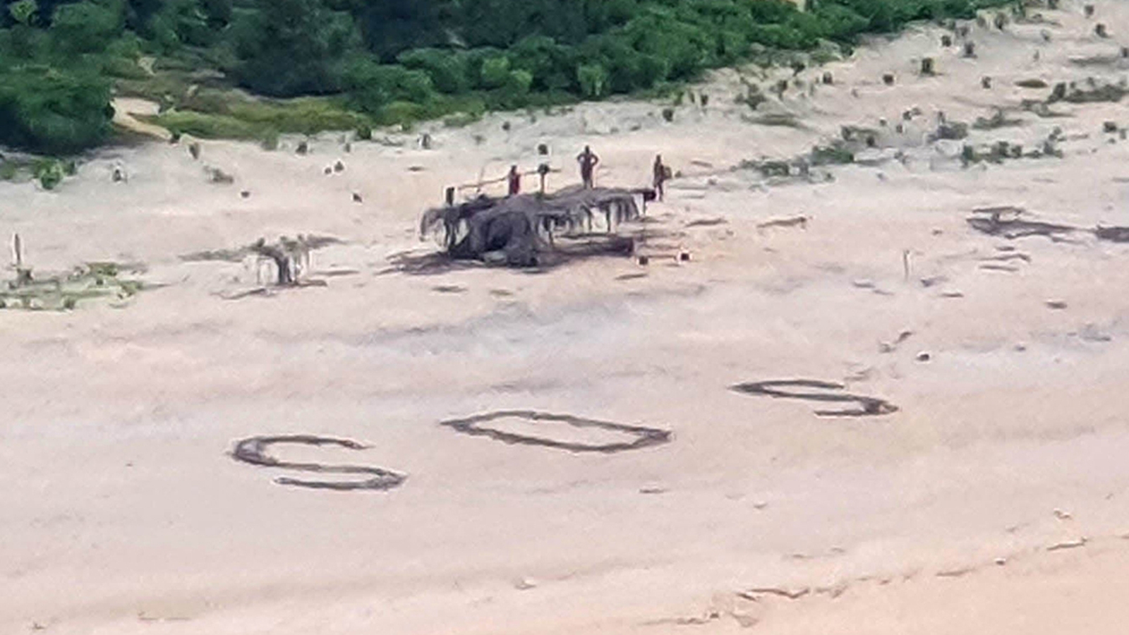 Giant SOS message leads to rescue of stranded sailors