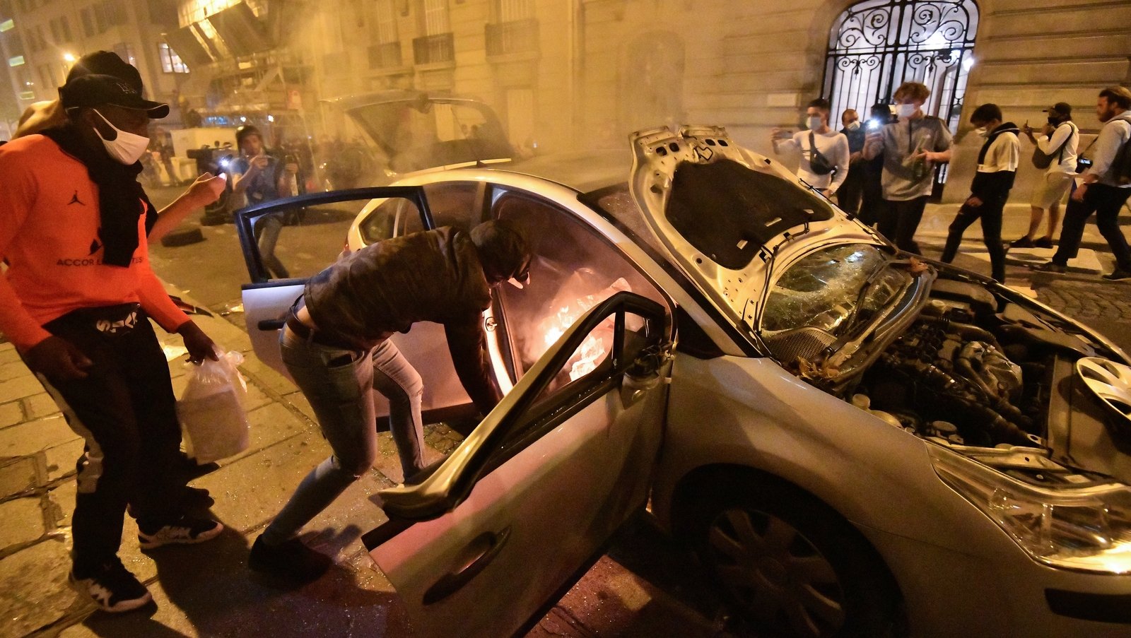 Scores arrested as PSG fans riot in Paris after defeat