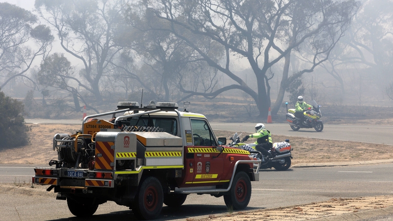 'Lives and homes' at risk as fire nears Perth