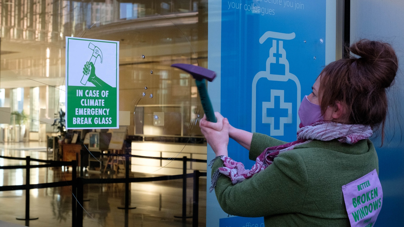 Protesters break windows at Barclays London HQ