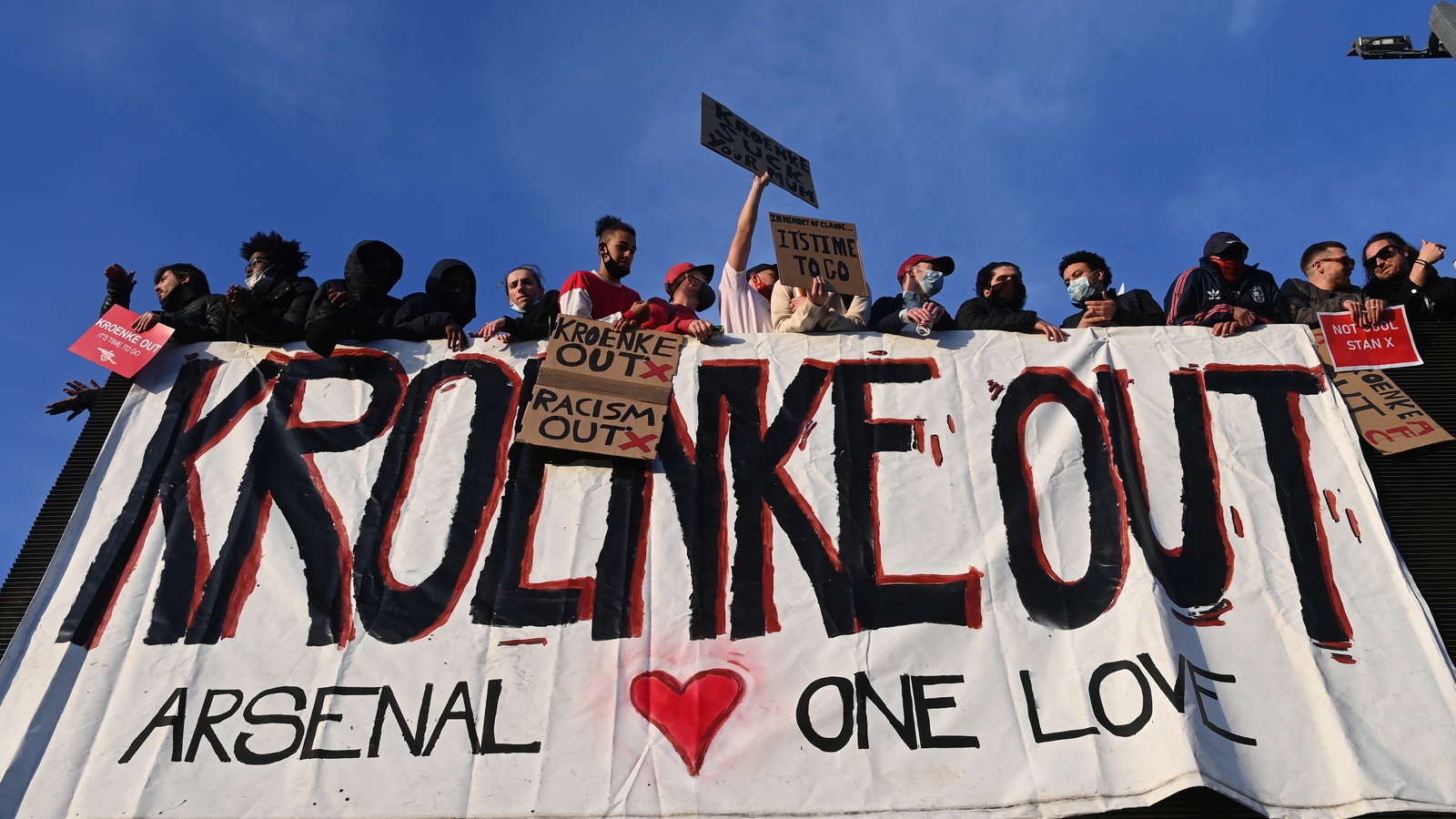 Thousands march on the Emirates in protest