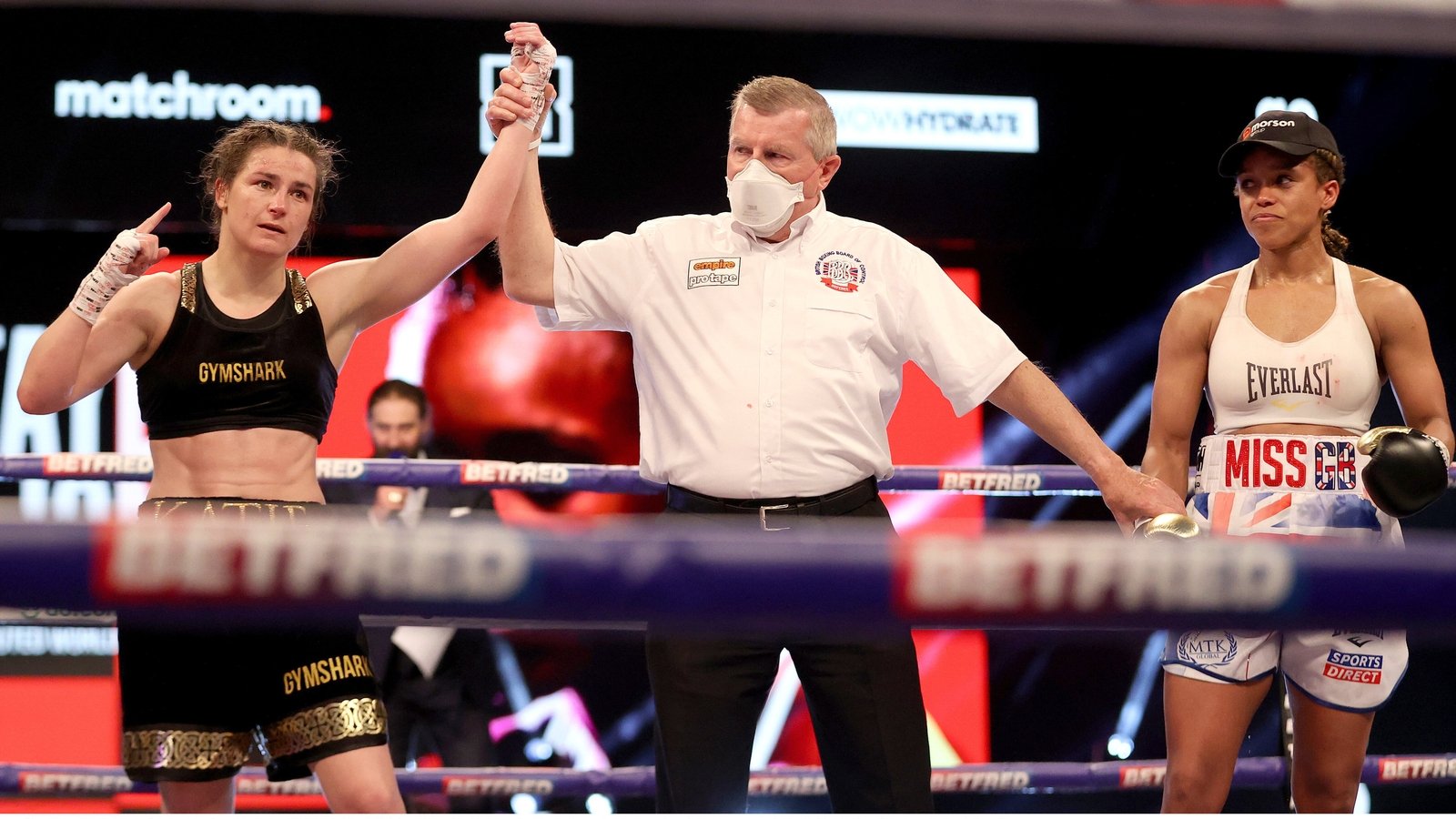 Katie comes through tough test to remain world's best