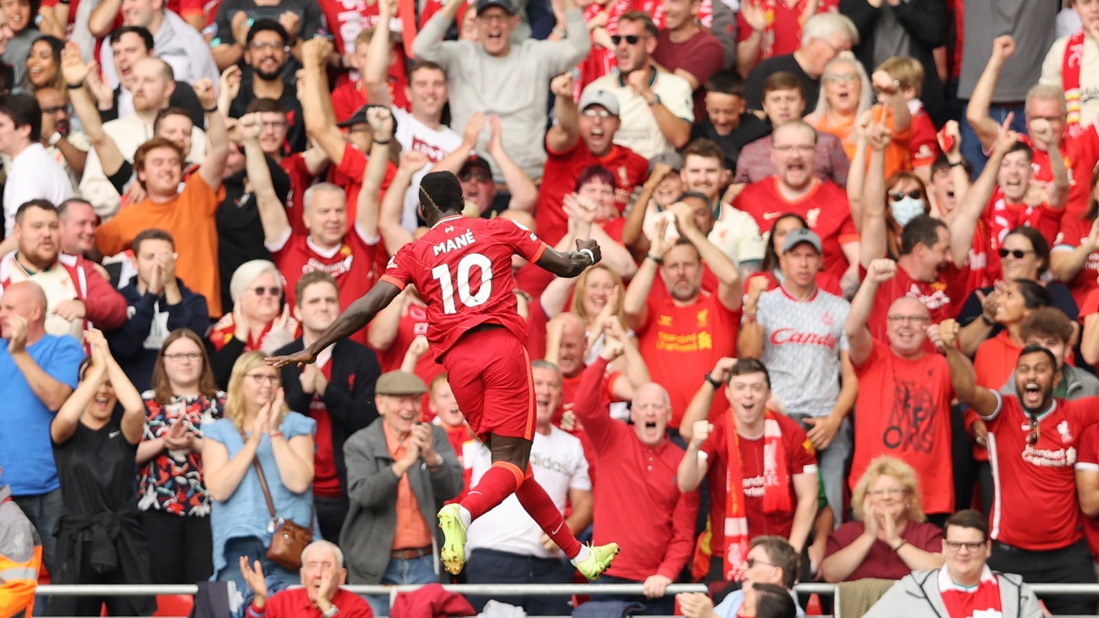 Mane hits 100th goal as Liverpool move clear at top