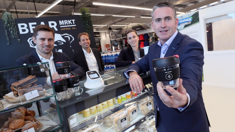 Paying for coffee using a reusable cup