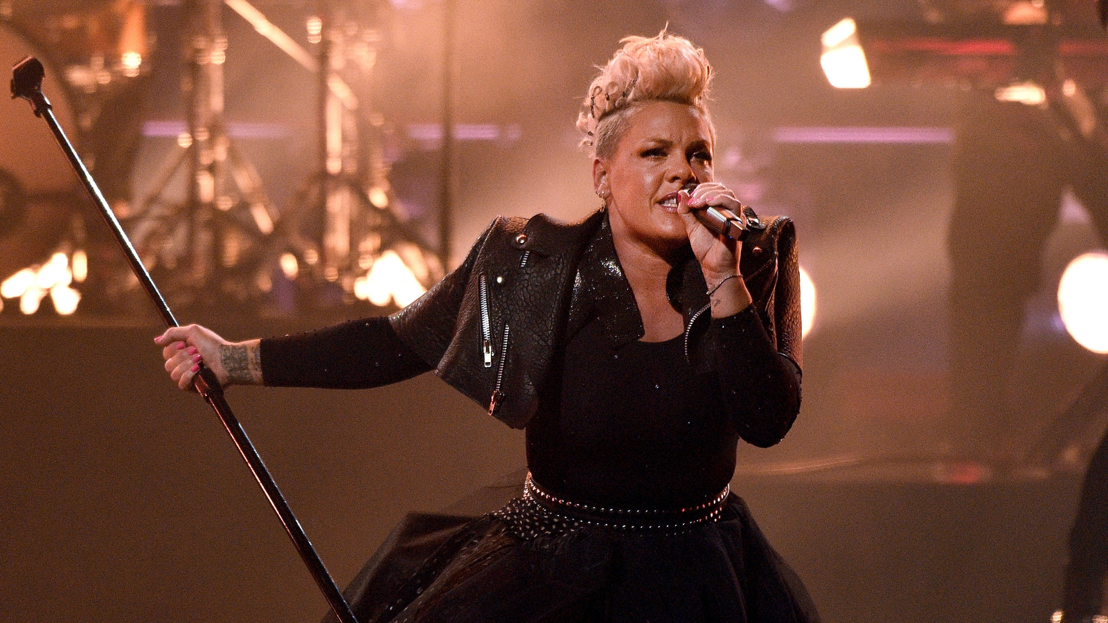 Pink recovering after "brutal" hip surgery